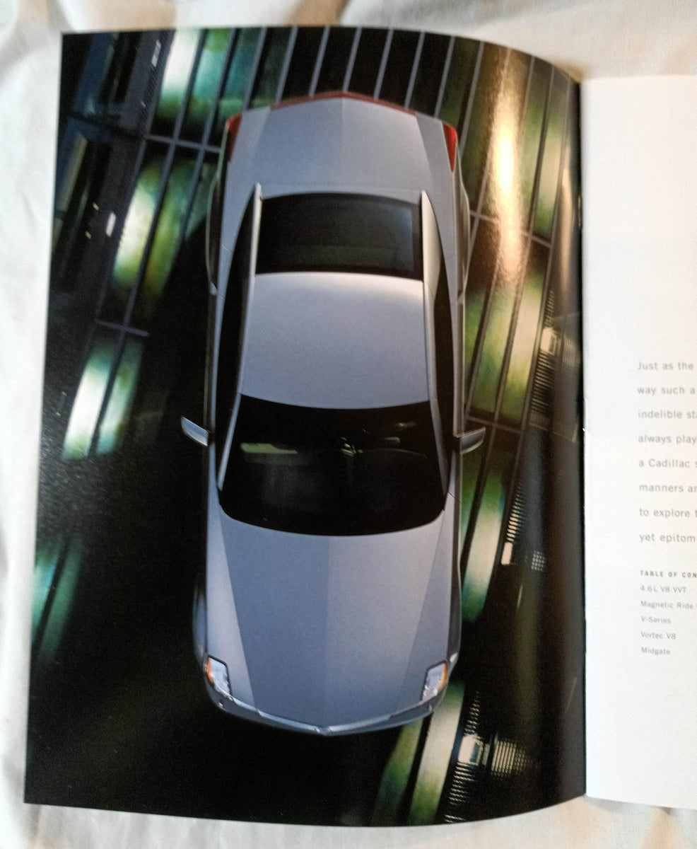 Cadillac 2004 Full Line Sales Brochure Escalade Seville Deville XLR CT ...